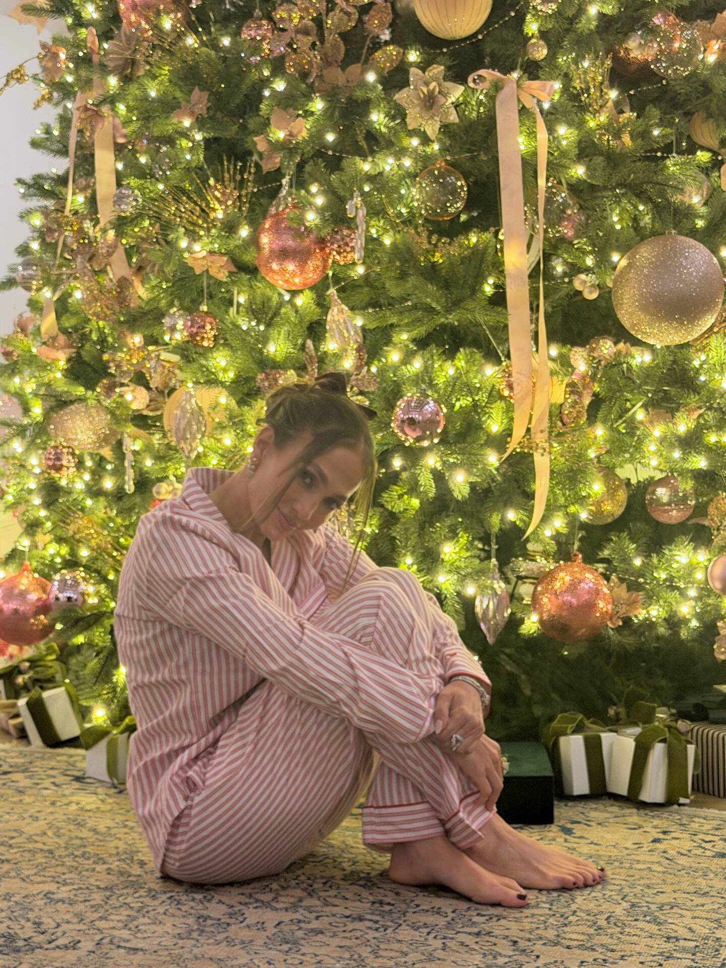 Jennifer Lopez Enjoys a Cozy Christmas With Her Family in Candy-Striped ...